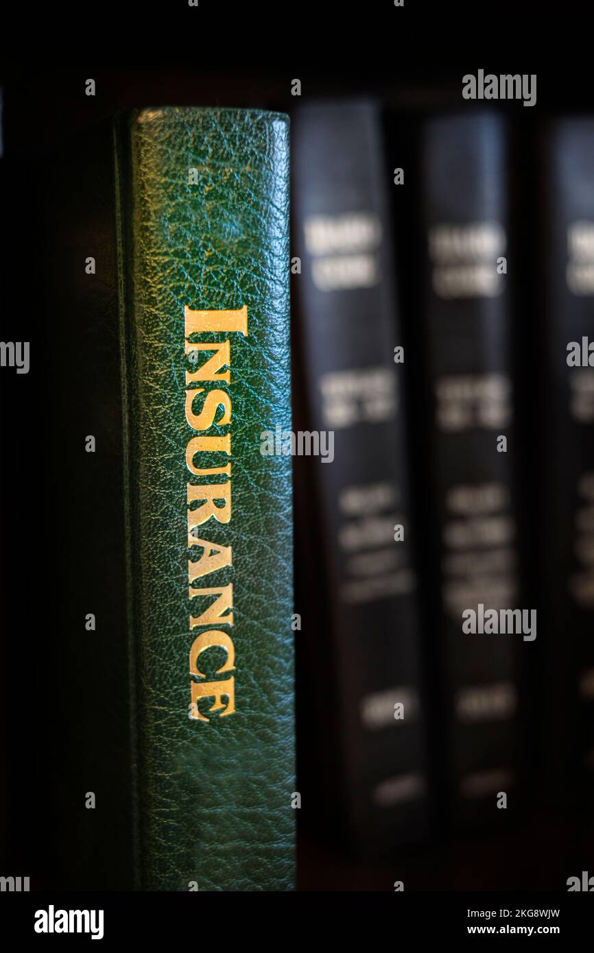 Insurance concept book house hi-res stock photography and images - Alamy