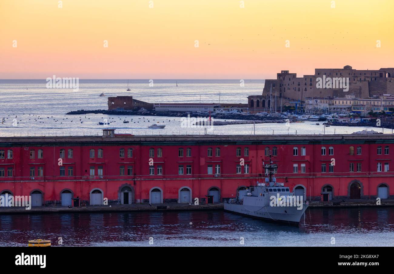 Navy Warship at a port with Historic Downtown City on Mediterranean ...