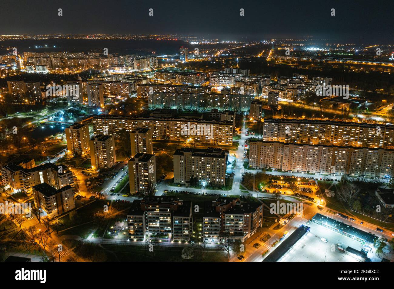 Warsaw by night, aerial landscape of illuminated streets and buildings ...