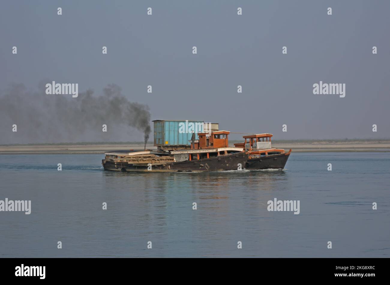 two river ferries intandem to carry truck over the river Lohit River ...