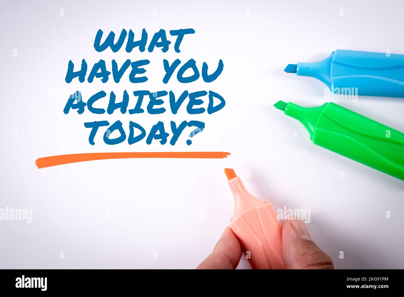 What have you achieved today. Text and colored markers on a white ...
