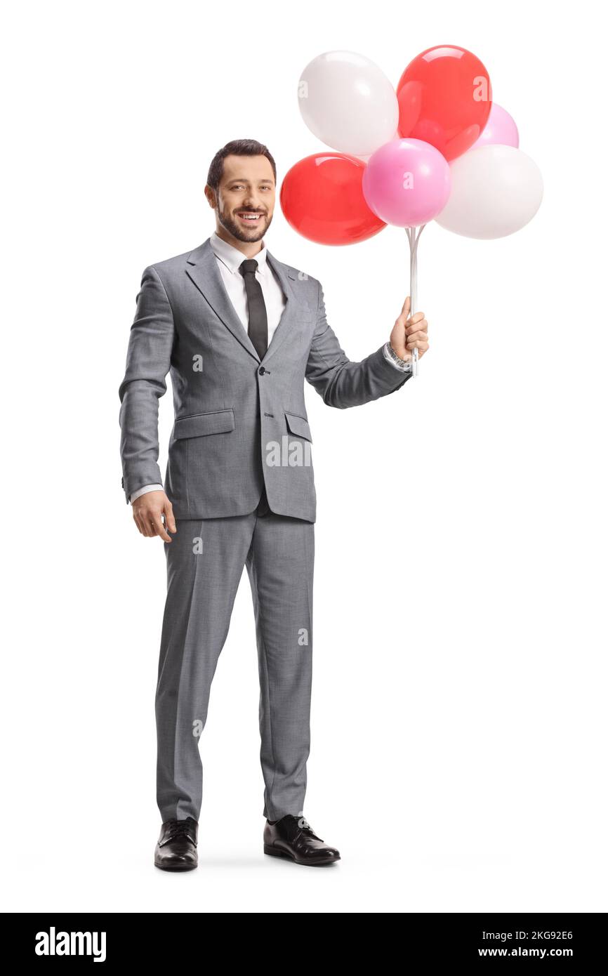 Man holding balloons Cut Out Stock Images & Pictures - Alamy