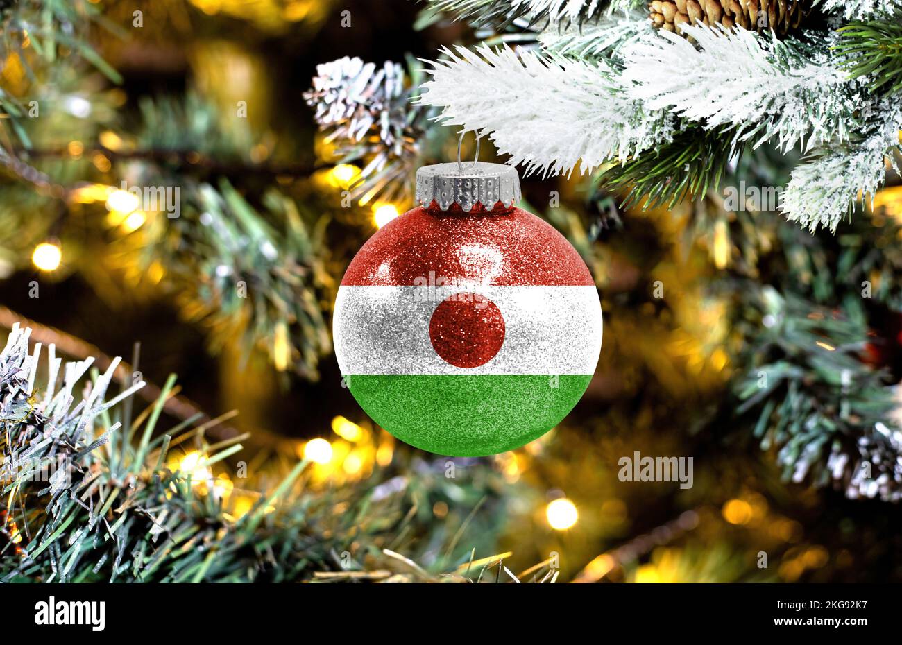 New Year's glass ball with the flag of Niger against a colorful ...