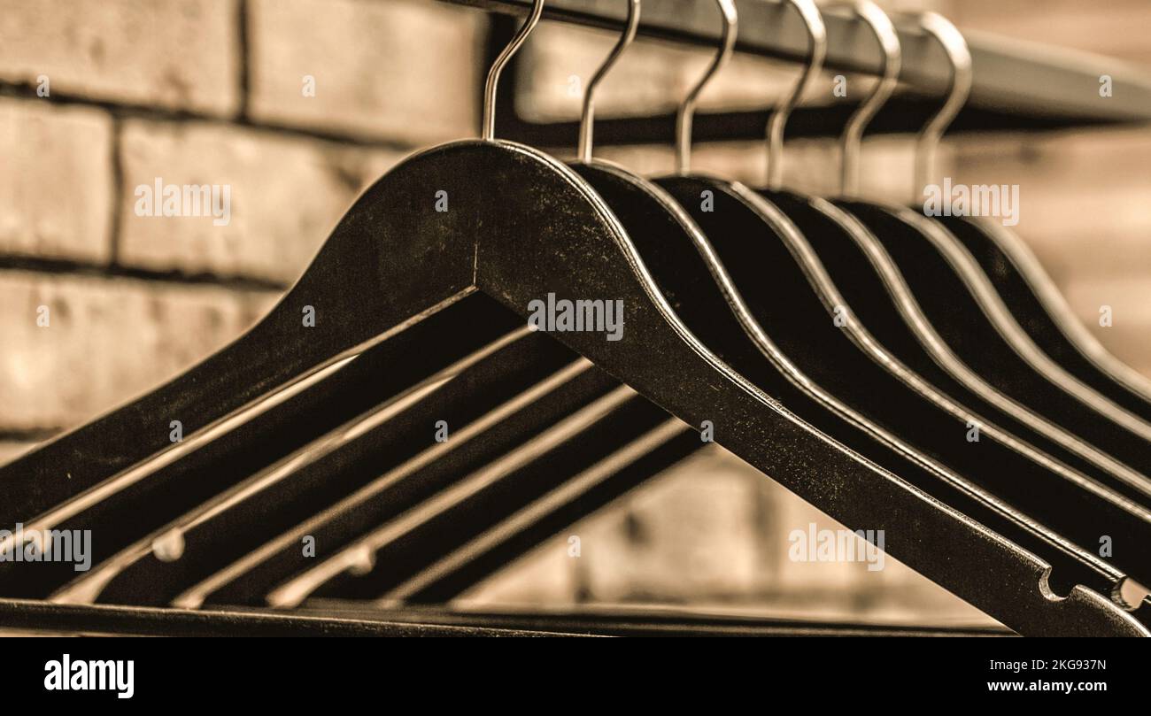 Fashionable different types of hanger. Wooden coat hanger clothes. Many ...