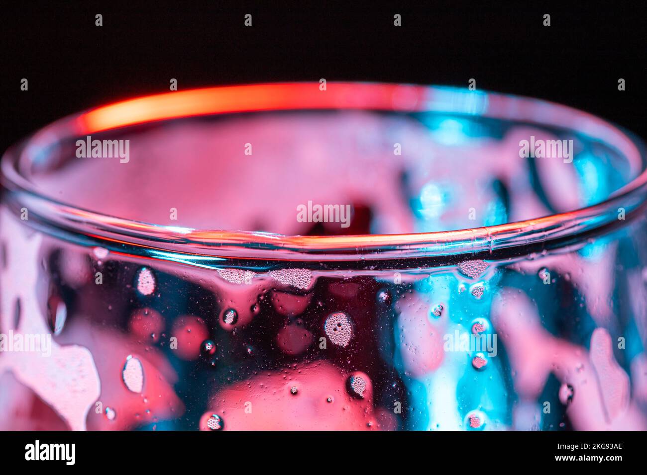 A horizontal image of the top of an empty glass of Champaign in the ...