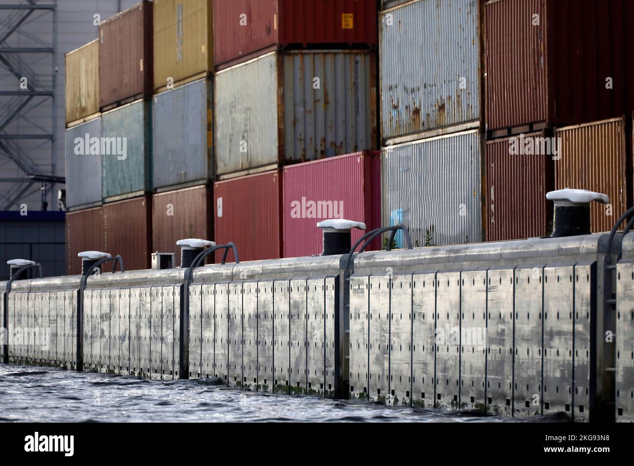 Stack of freight containers at a dockside in a harbour Stock Photo - Alamy