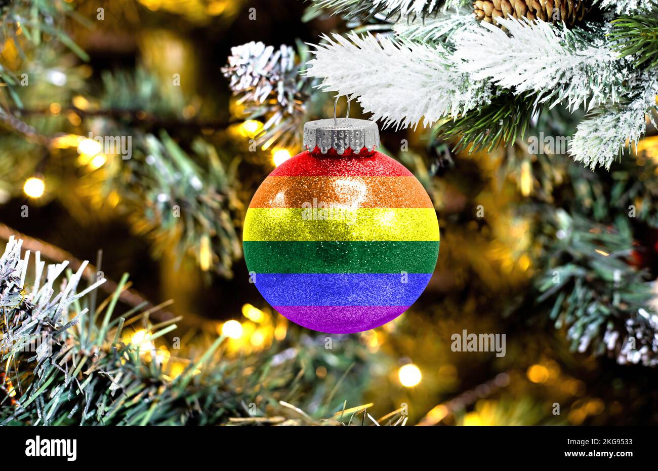 New Year's glass ball with the flag of LGBT against a colorful ...