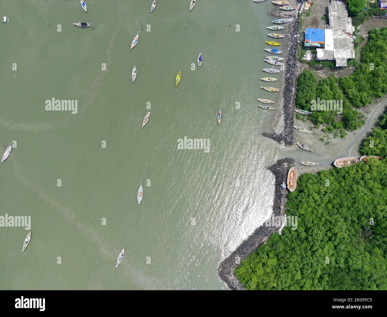 Top view of waterfront city with boats in Suramadu, Surabaya, Indonesia ...