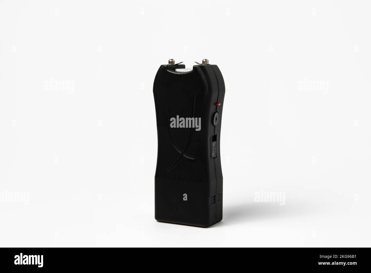 Black electric shocker with a flashlight on a white background Stock ...