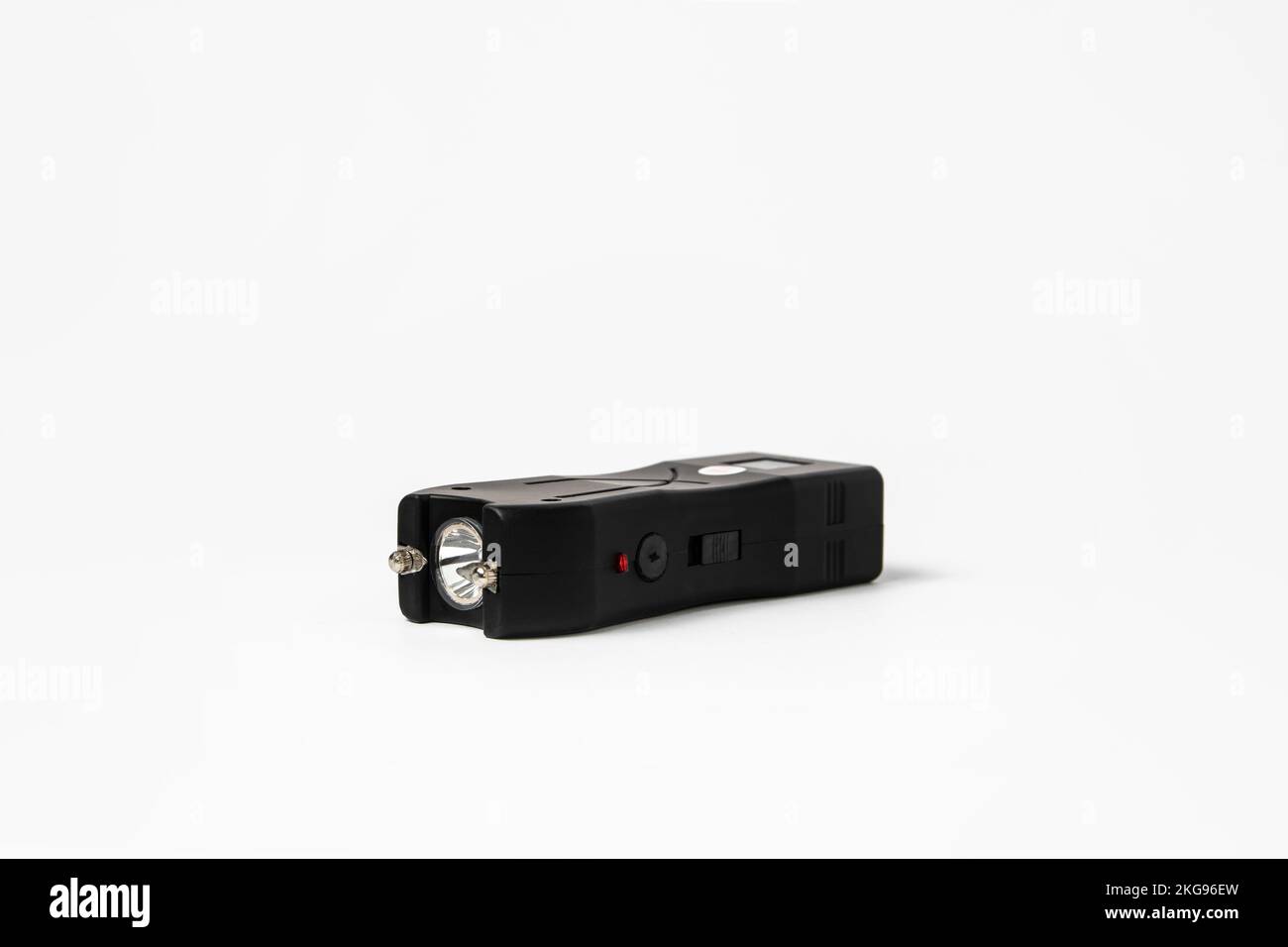 Black electric shocker with a flashlight on a white background Stock ...