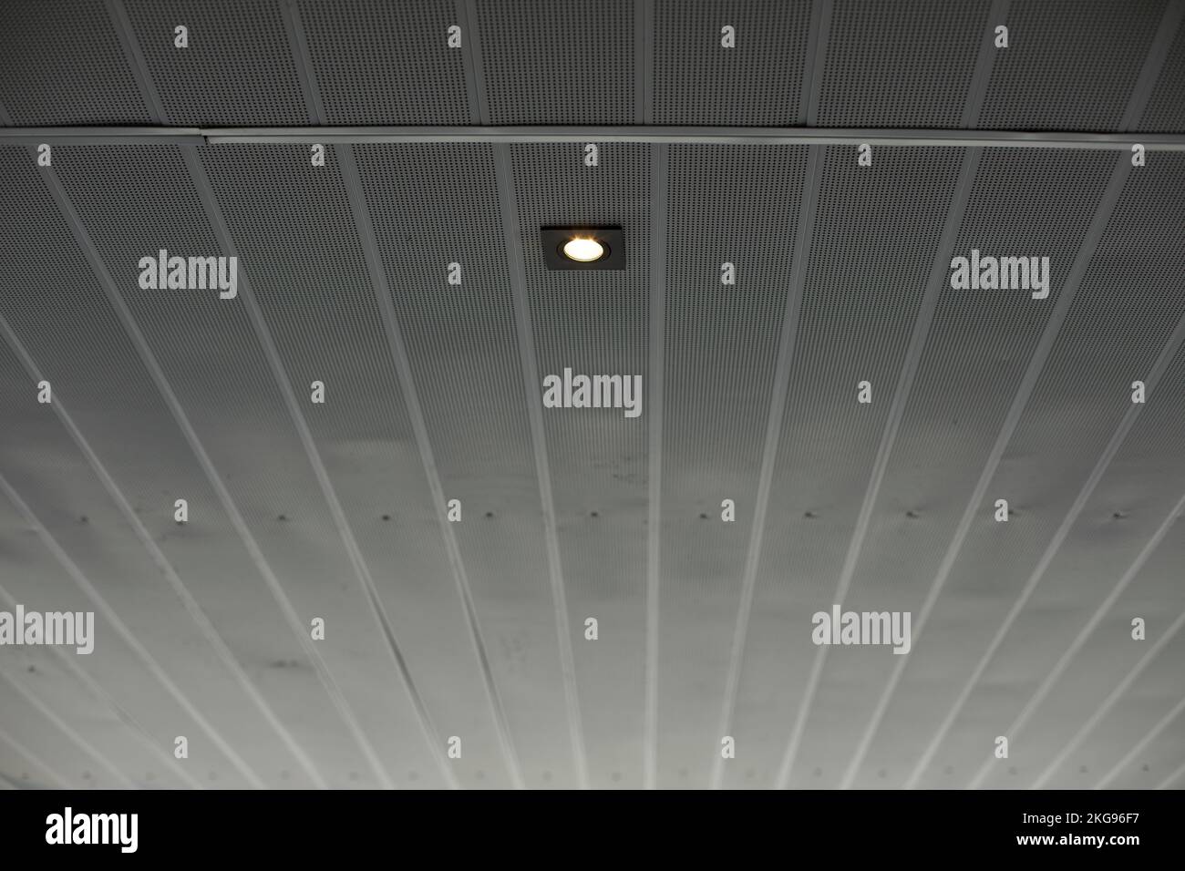 Ceiling of building canopy. White ceiling. Architectural details. Shop ...