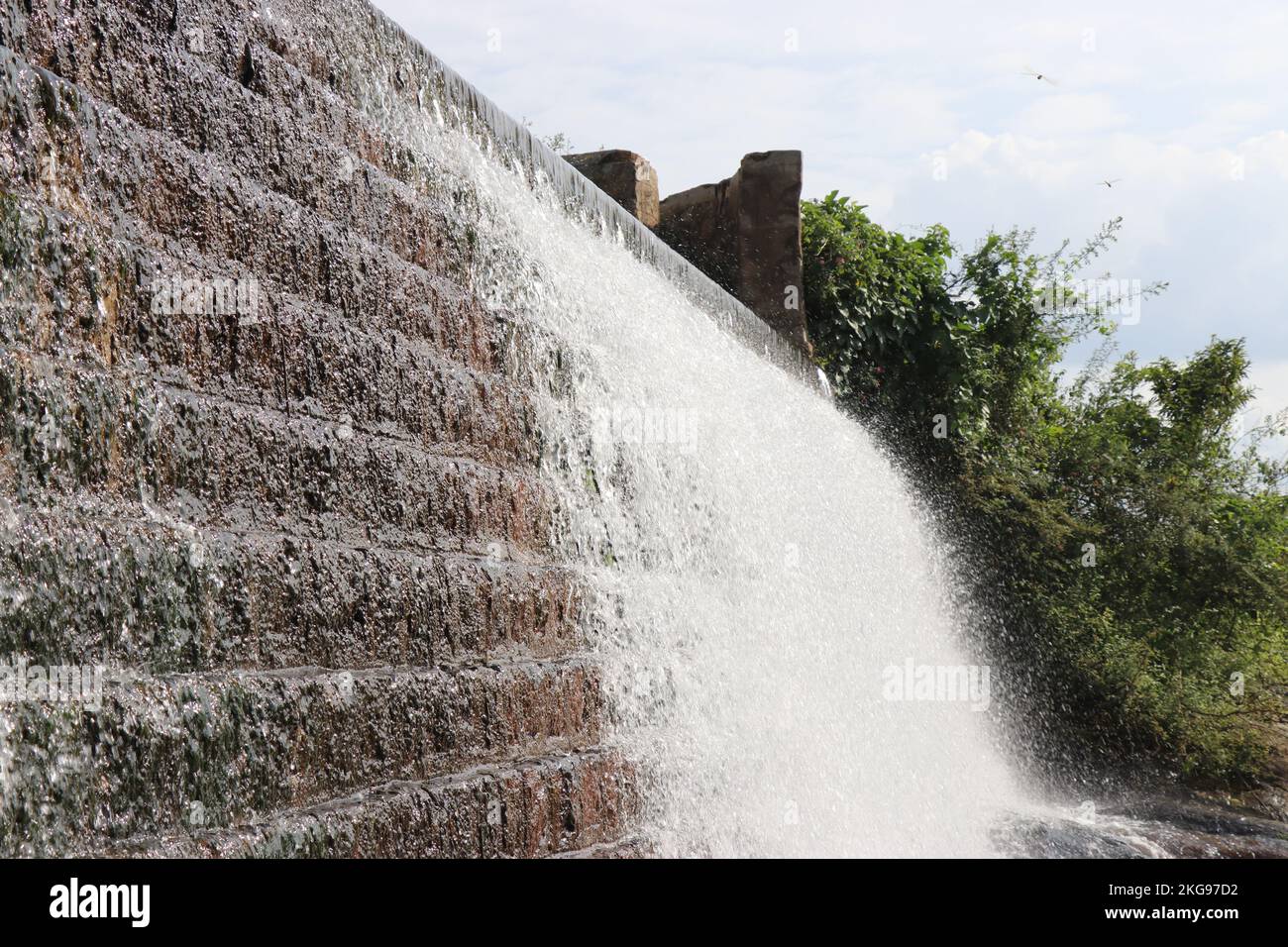 Water flowing through bricks from a overflowing dams reservoir Stock ...