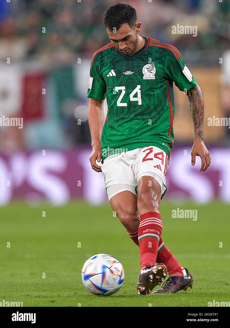 DOHA, QATAR - NOVEMBER 22: Luis Chavez of Mexico passes the ball during ...