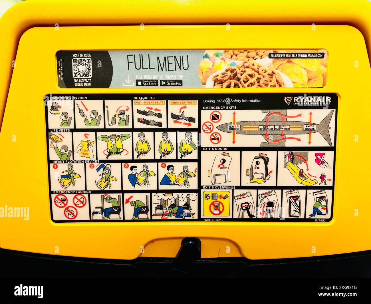 Emergency evacuation procedures printed on the back of a Ryanair plane ...