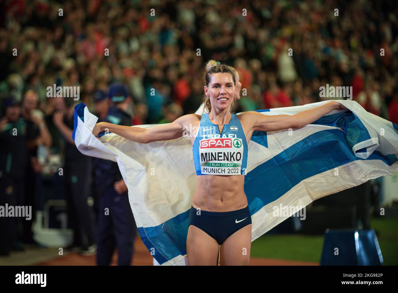 Hanna Minenko with her country's flag of the triple jump at the ...
