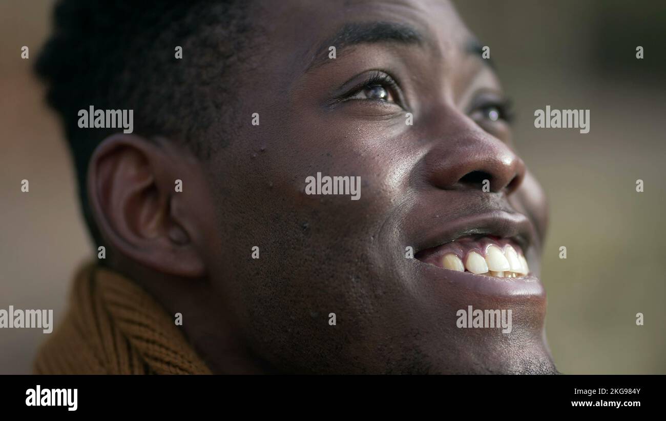Smiling happy black african man portrait face close-up Stock Photo - Alamy