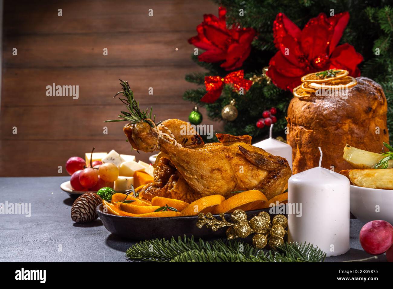 Christmas or New Year dinner foods on dark table. Set of traditional ...