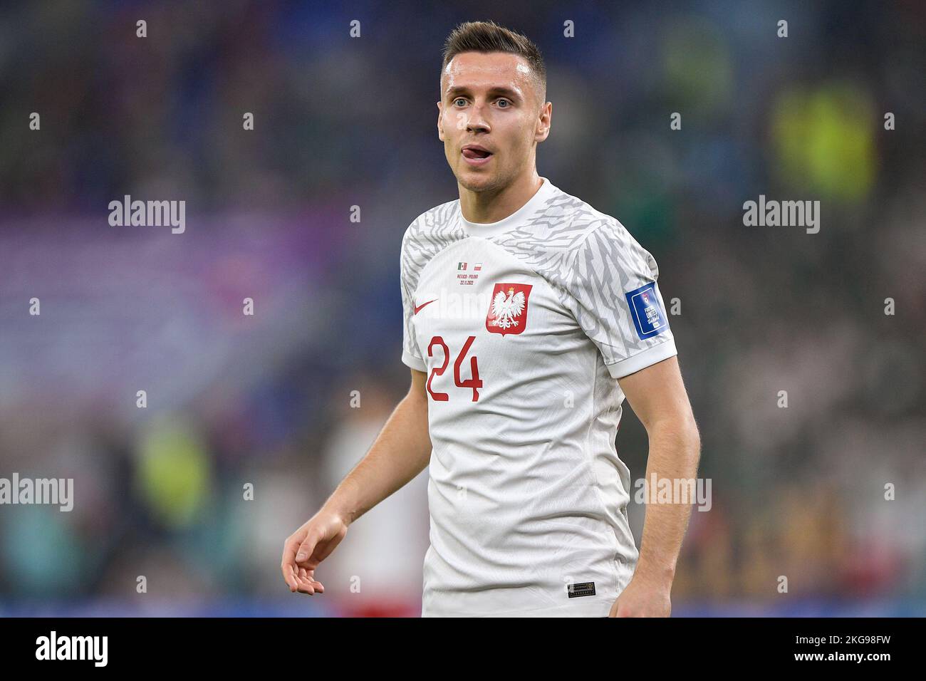 DOHA, QATAR - NOVEMBER 22: Przemyslaw Frankowski of Poland looks on ...