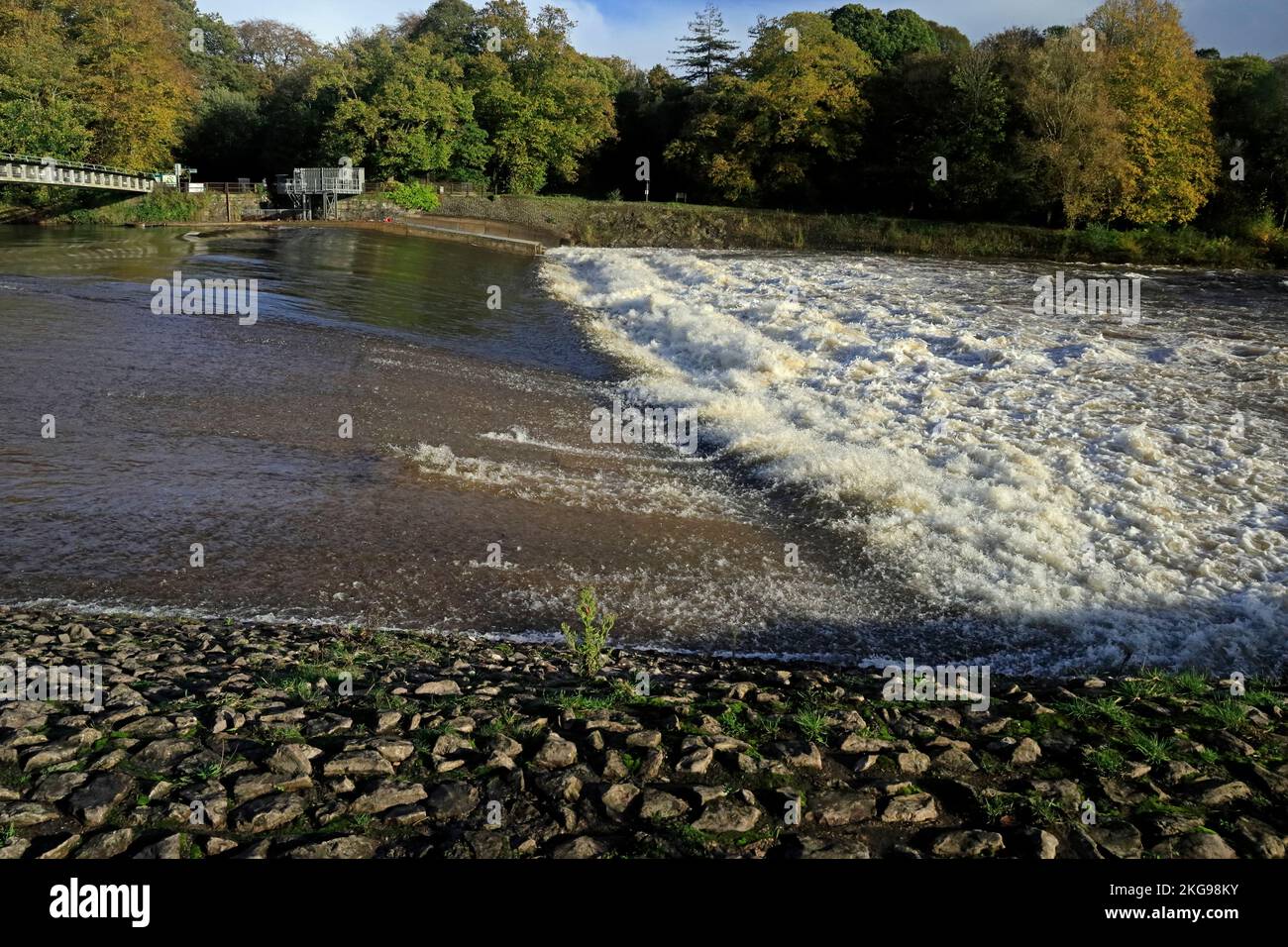 The river Taff at Blackweir after heavy rain. White water at the weir ...
