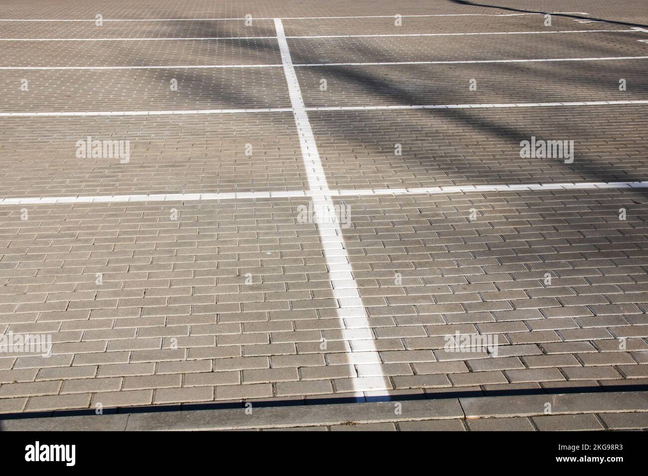 Markings in an empty parking lot for cars close up Stock Photo - Alamy