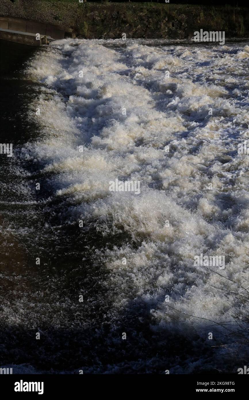 The river Taff at Blackweir after heavy rain. White water at the weir ...