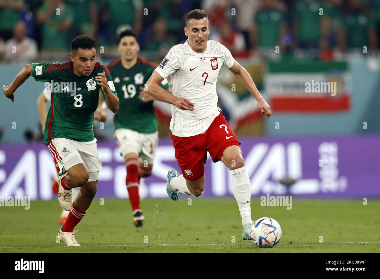 DOHA - Qatar, 22/11/2022, (LR) Carlos Rodriguez of Mexico, Arkadiusz ...