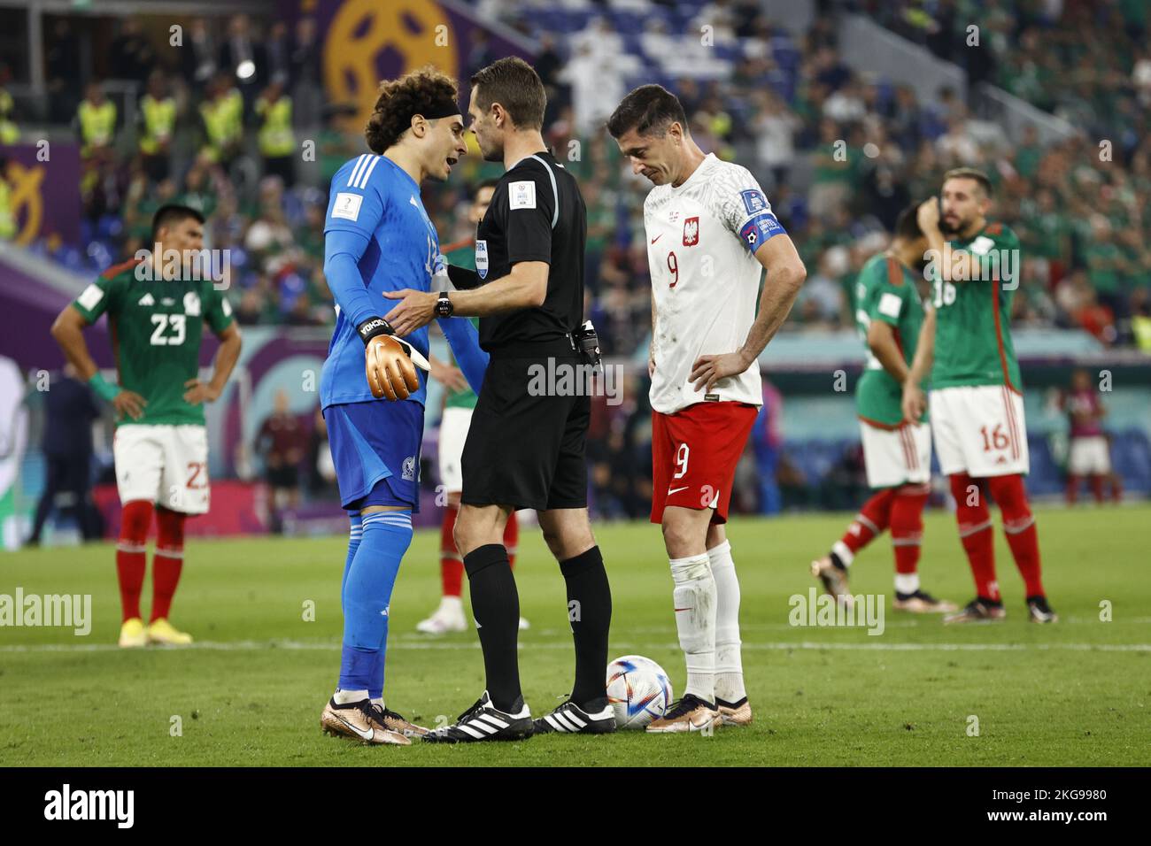 DOHA - Qatar, 22/11/2022, (LR) Mexico goalkeeper Guillermo Ochoa ...