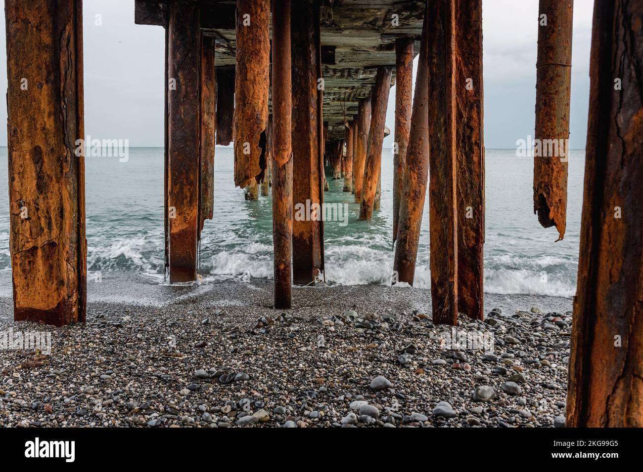 Old broken down pier on beach of Alushta. Crimea Stock Photo - Alamy