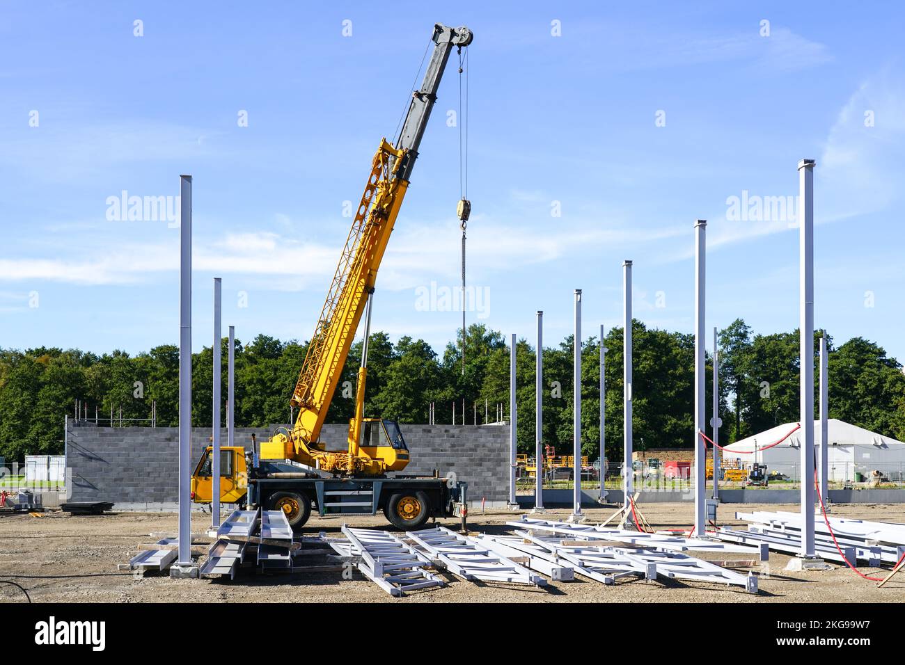 Construction site of a new modern industrial building with vertical ...