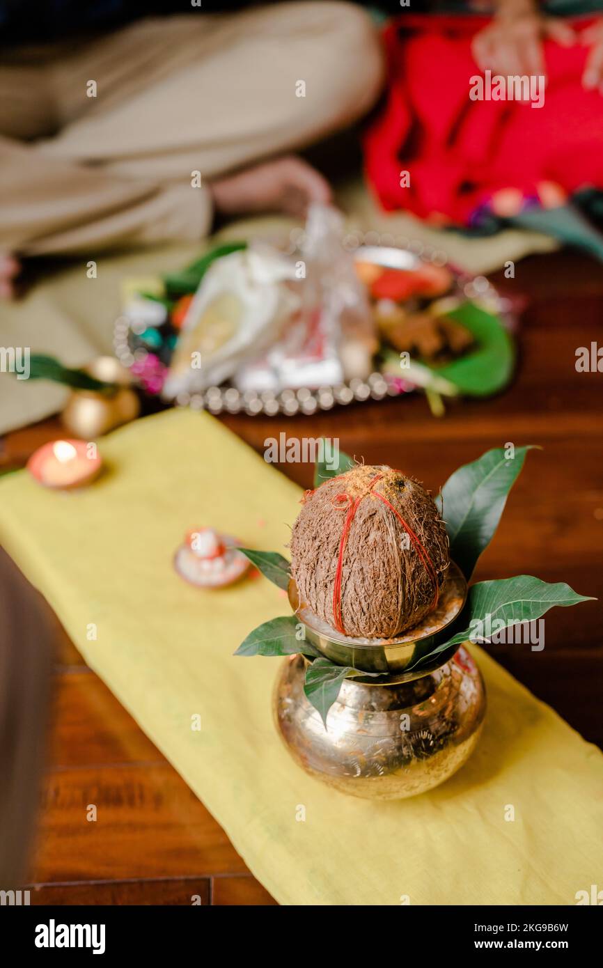 Indian rituals on an auspicious day to perform pooja by placing coconut ...