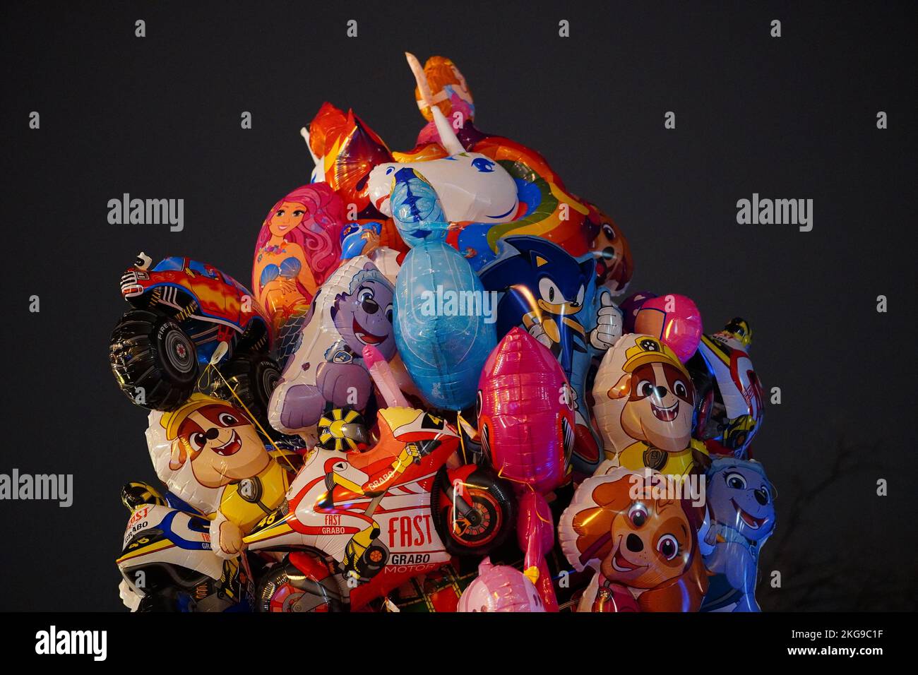 Helium cartoon characters balloons hi-res stock photography and images ...