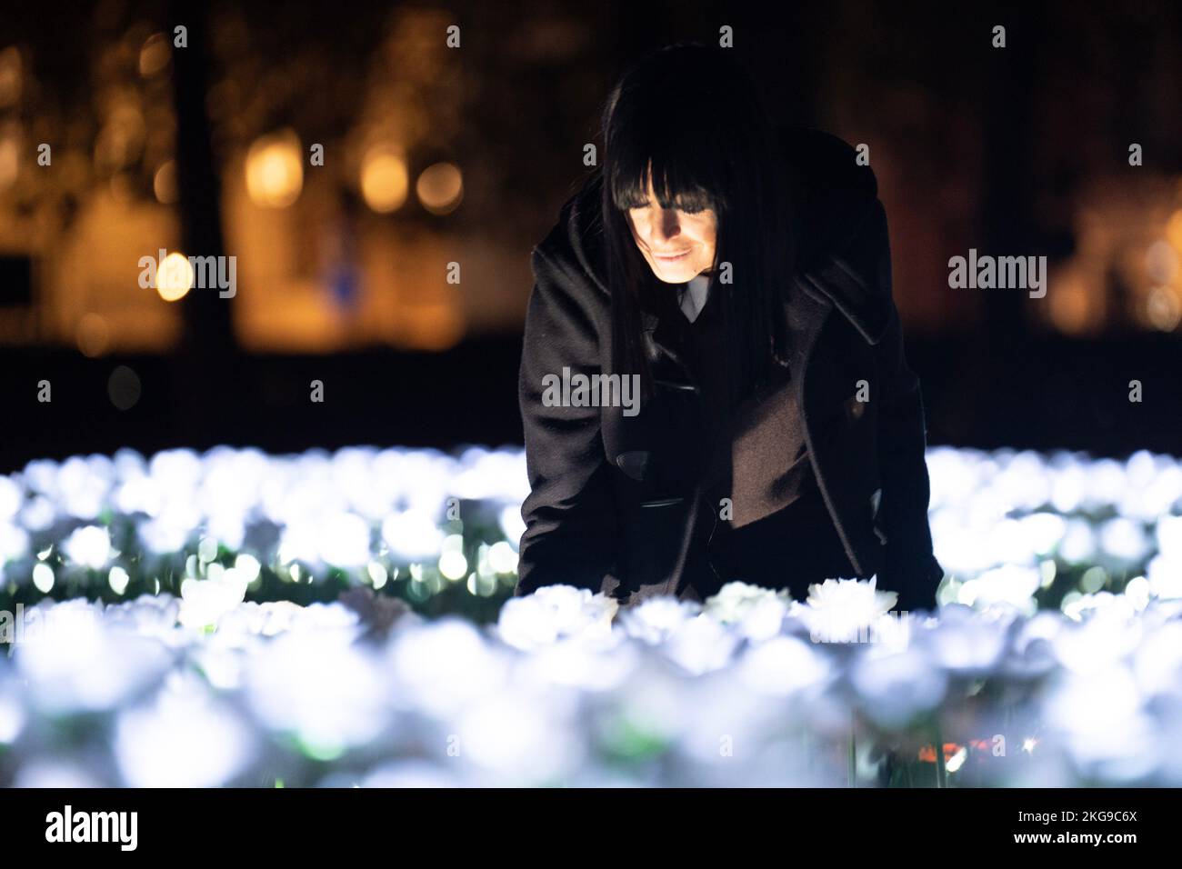 Claudia Winkleman looks at roses dedicated in memory of loved ones, at ...