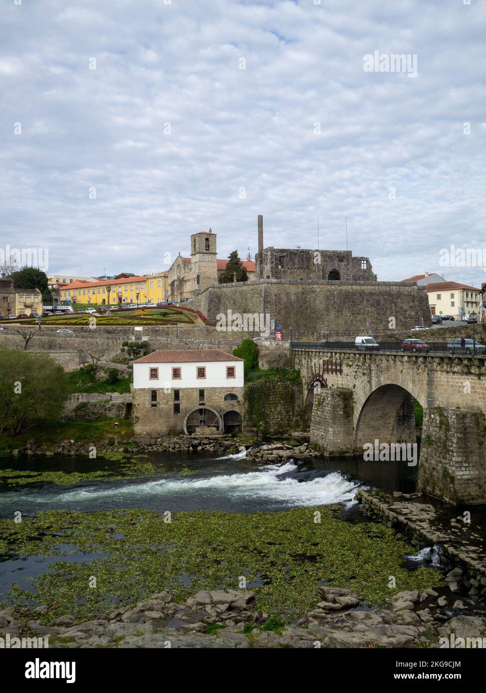 Barcelos medieval bridge over Cávado River aside the water mill Stock ...