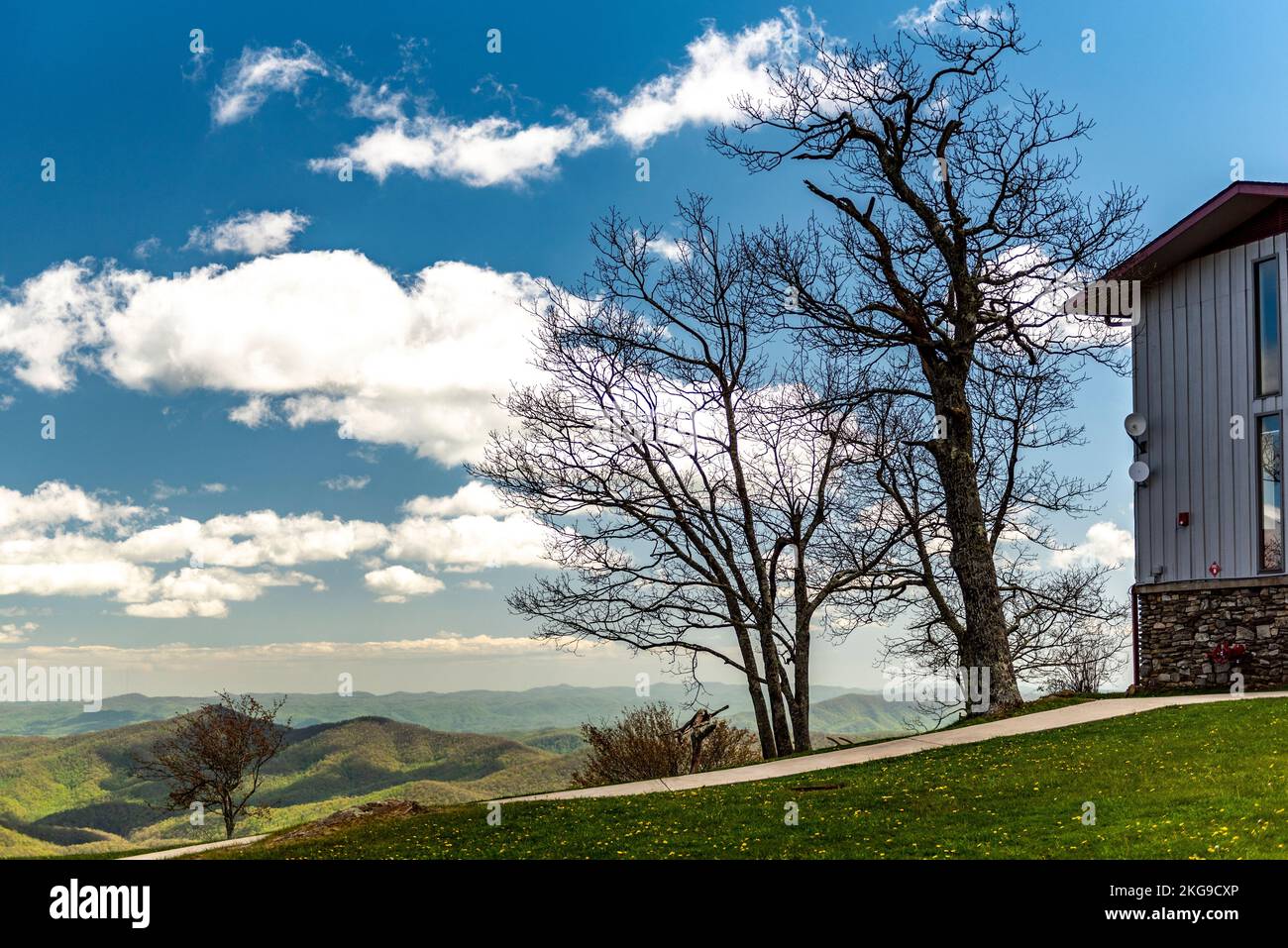 The high trees with hills in the Blue ridge parkway under the blue sky ...