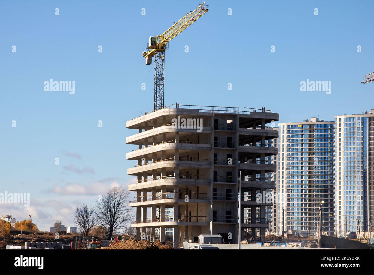 Construction of a tall building on the blue sky close up Stock Photo ...