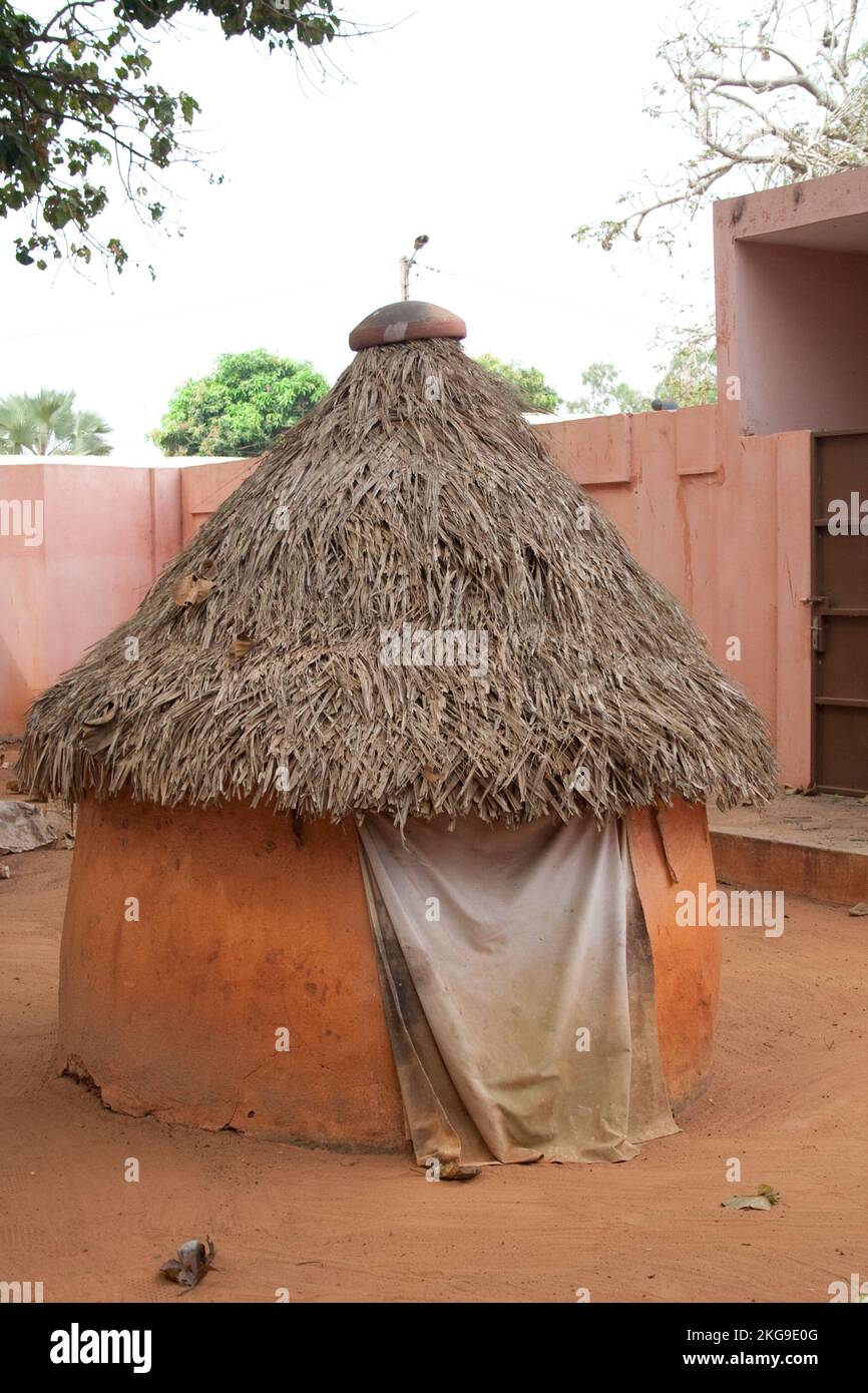 Purification hut, Temple of Pythons, Ouidah, Benin Stock Photo - Alamy