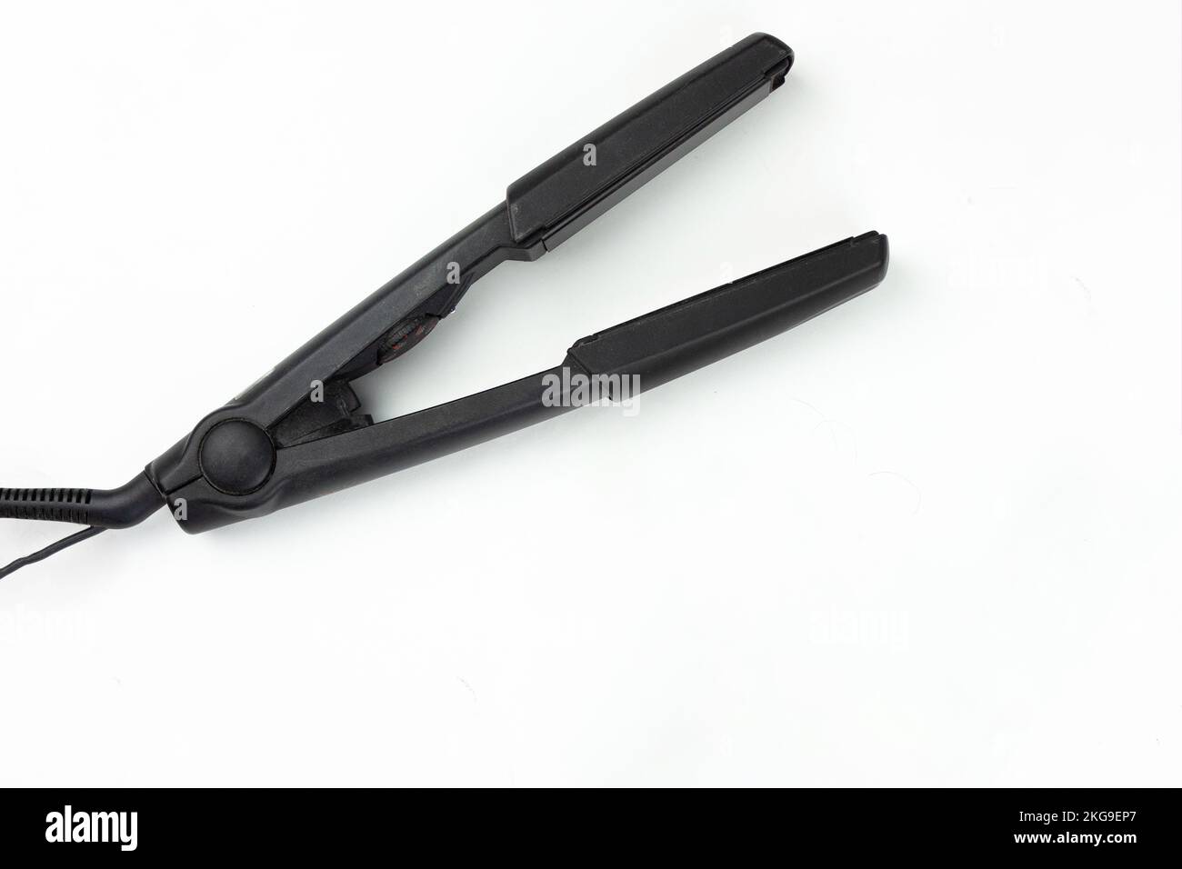Hair care concept. Metallic rosy ionic professional hair style tool ...