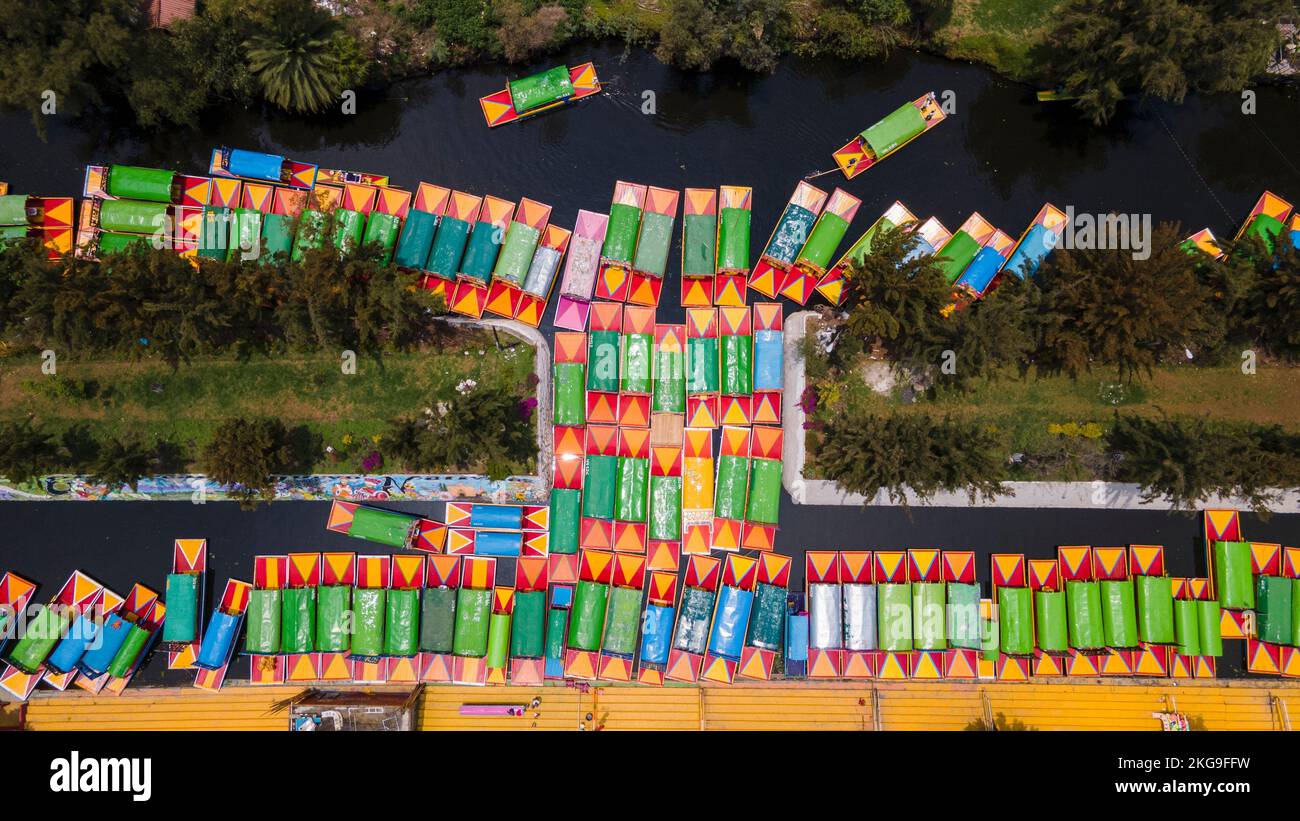 An aerial view of colorful boats of Las Trajineras in Xochimilco ...