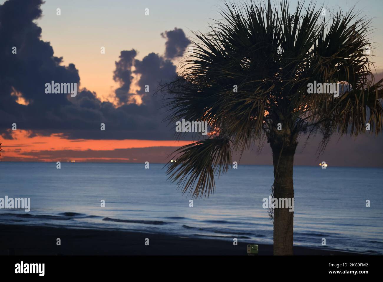 A beautiful vibrant sunset in on a beach in Galveston, Texas Stock ...