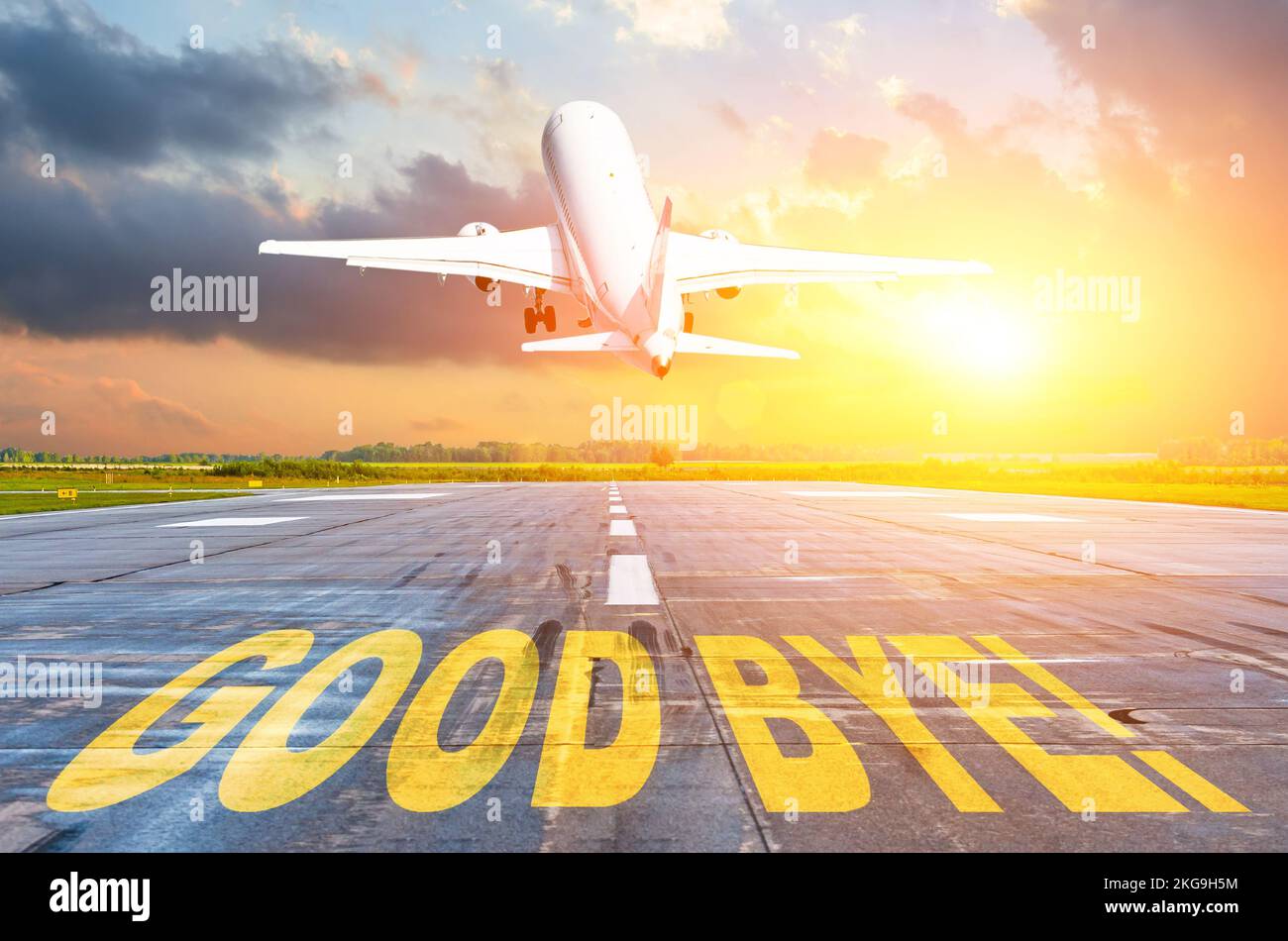 Good luck written on runway airport, and the airplane take off into the ...