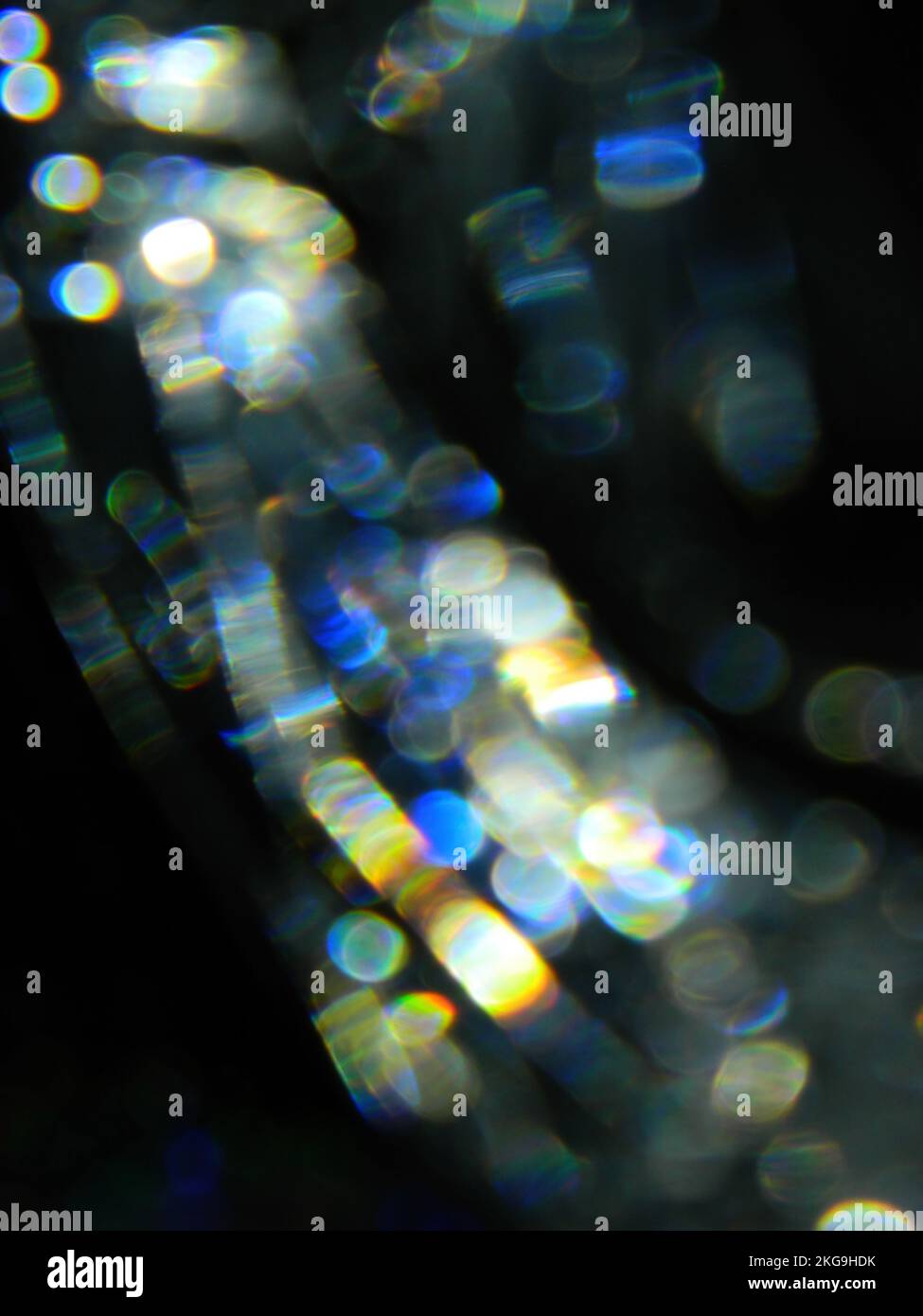 The verticalong exposure view of glowing particles shining in the ...
