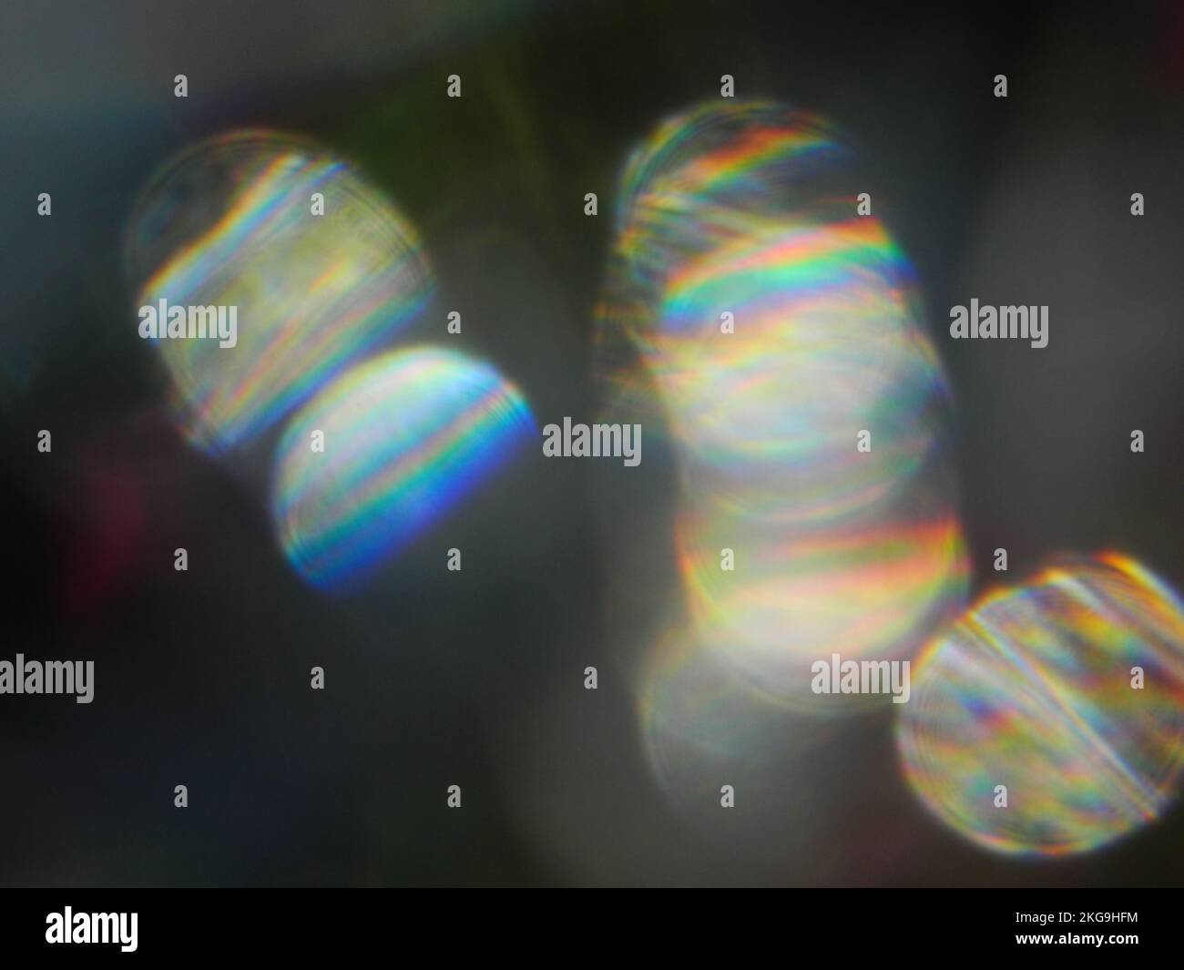 The long exposure view of glowing particles shining in the darkness ...