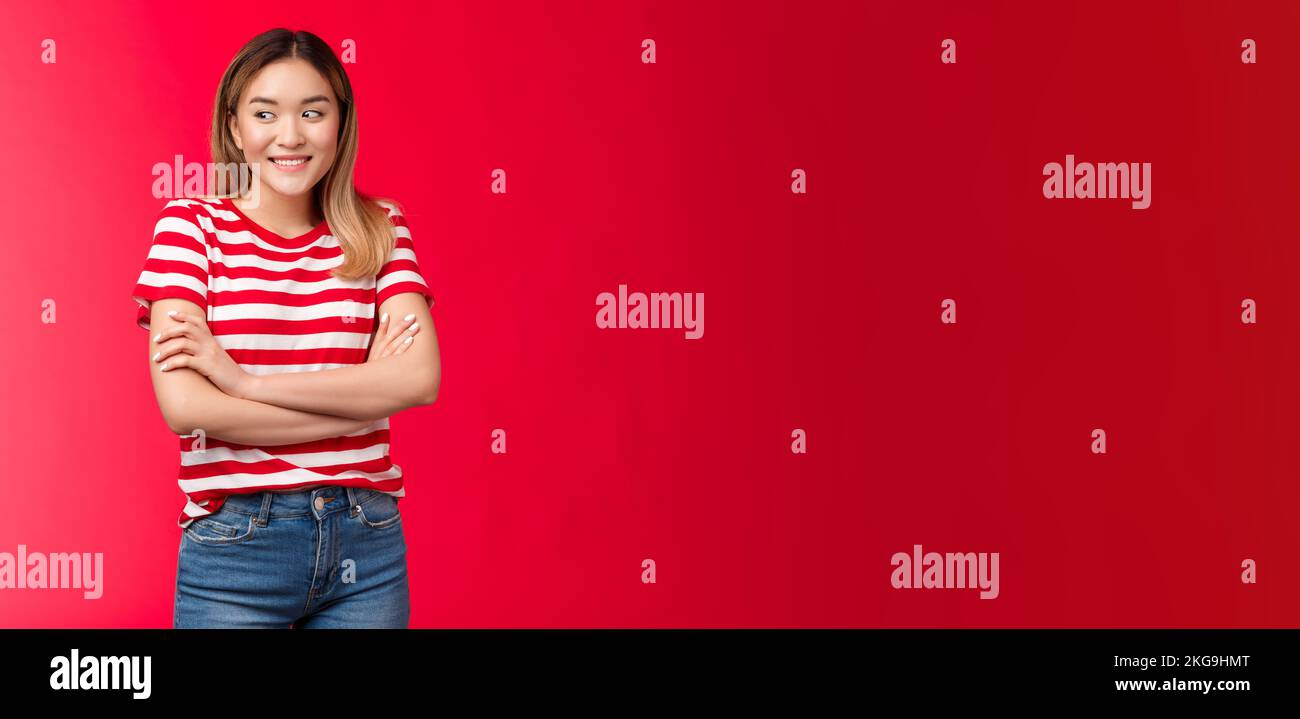 Silly cute pretty asian blond girl look away shy flirty smiling, cross ...