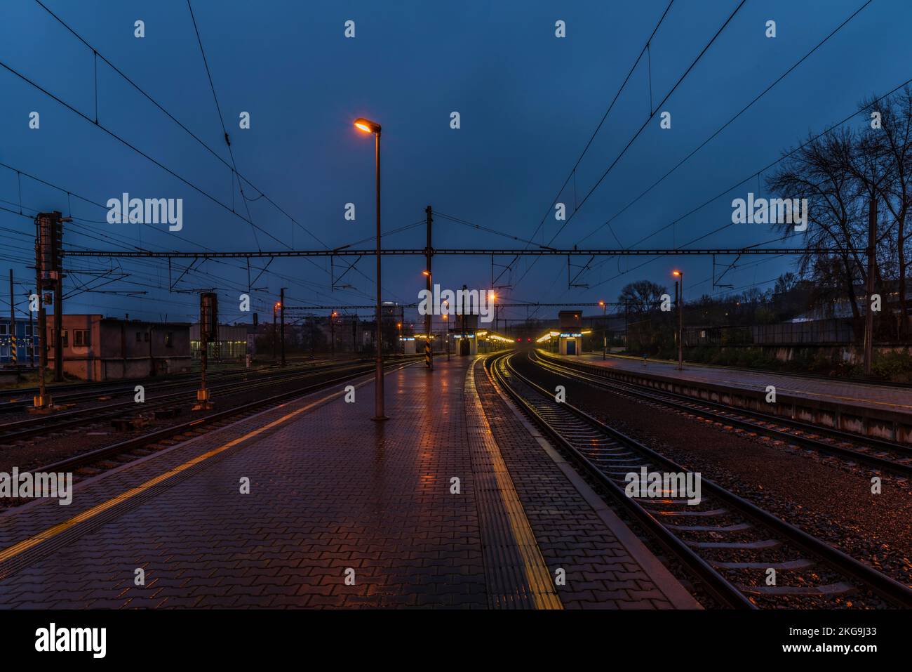 View on Prague Liben railway station in wet rainy evening Stock Photo ...