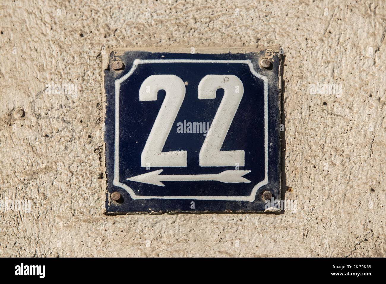 Weathered grunge square metal enameled plate of number of street ...