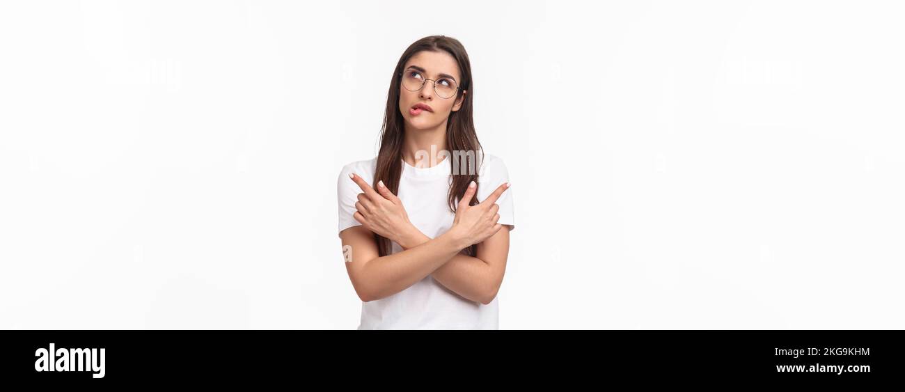 Waist-up portrait of thoughtful, smart and creative young decisive ...