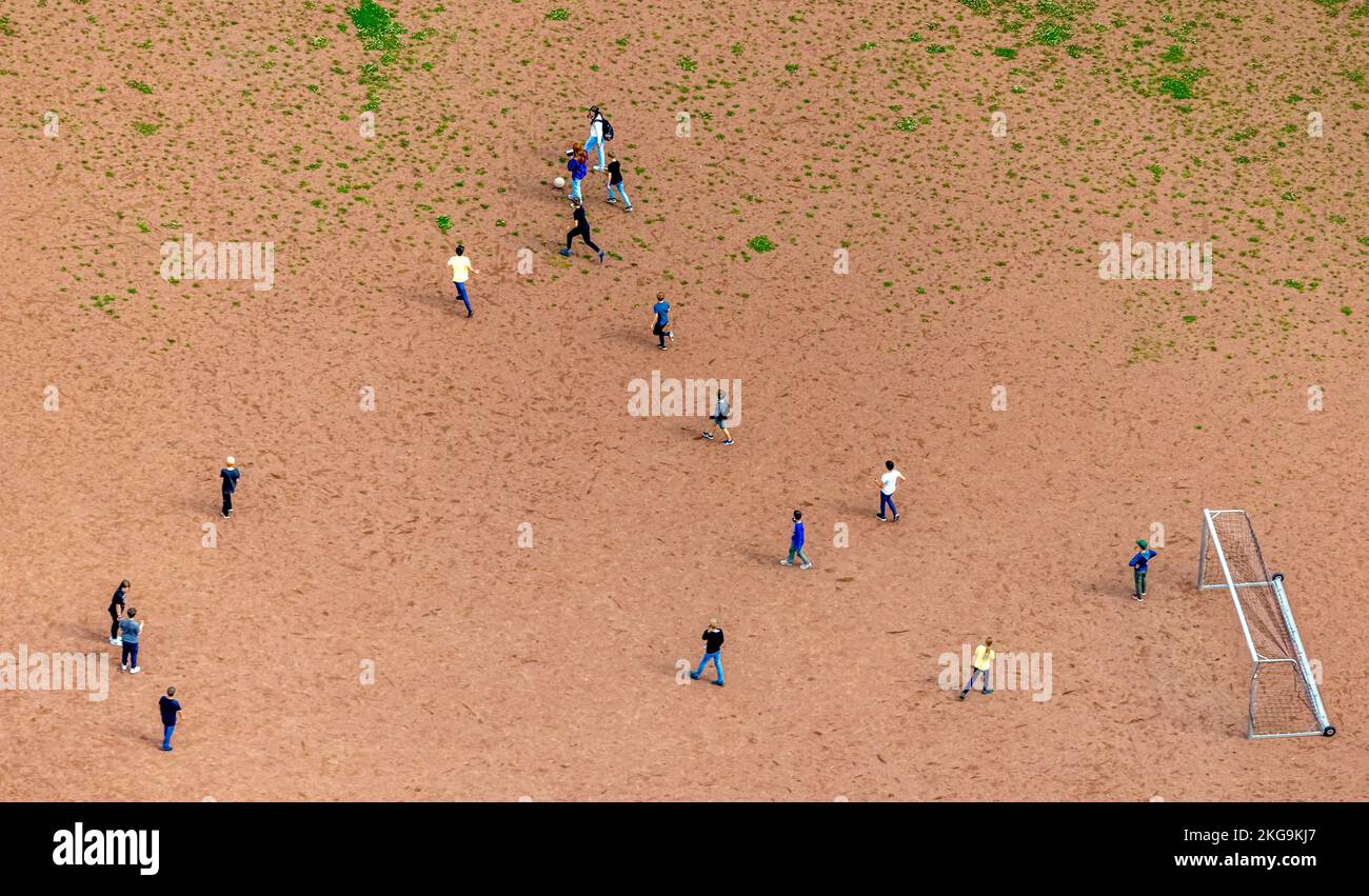 Children playing soccer on the sports field gymnasium der benediktiner ...