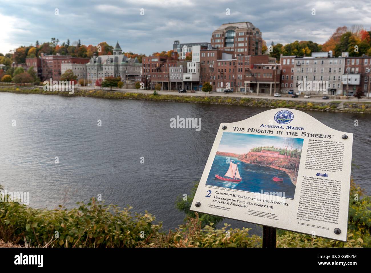 The historic and residential buildings on the bank of a river in ...