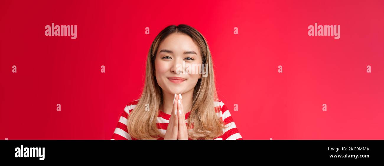 Thankful cute happy asian girl bowing politely show namaste gesture ...