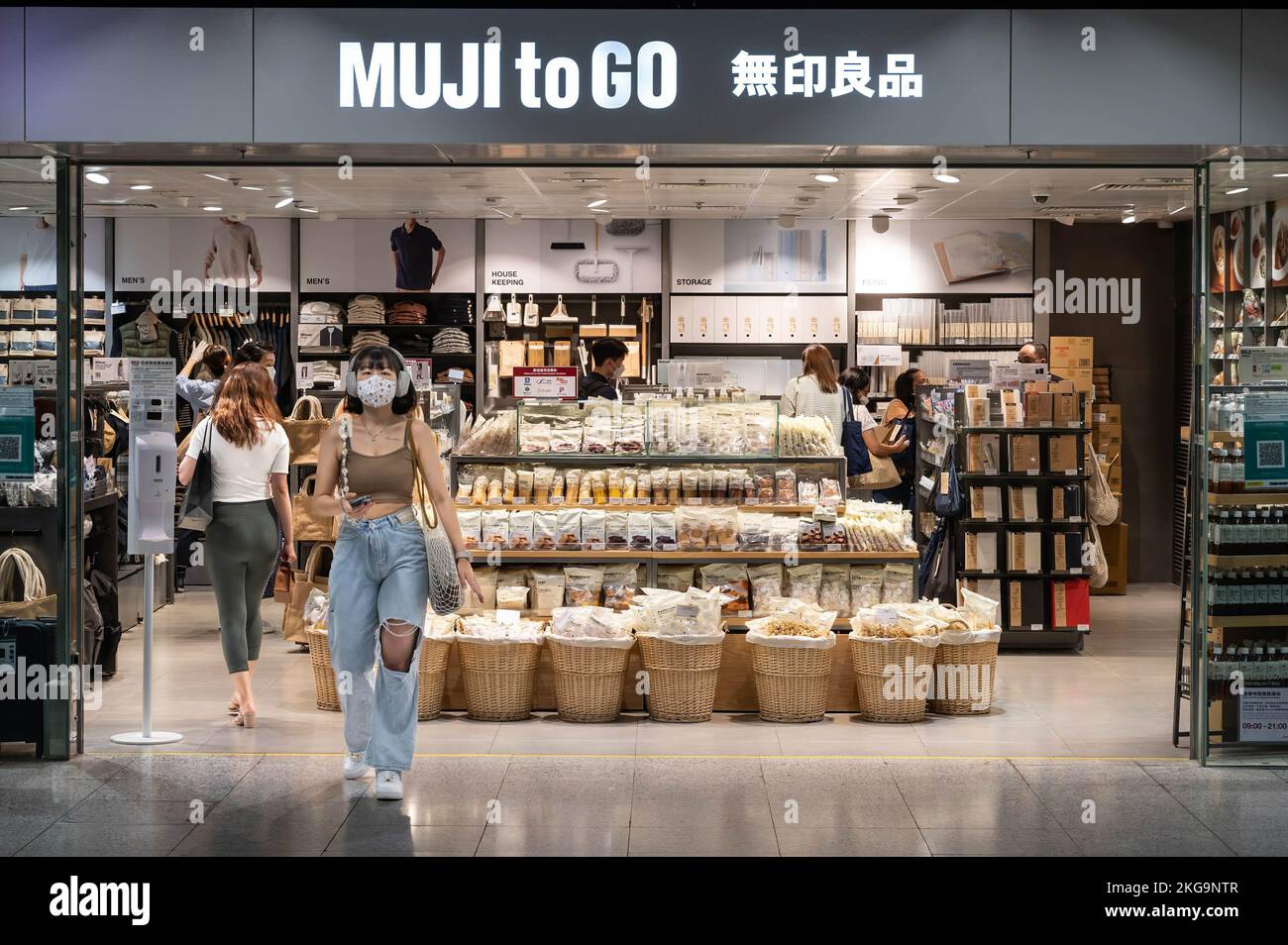 Shoppers are seen at the Japanese household and clothing retail company, Muji and Muji To Go ...